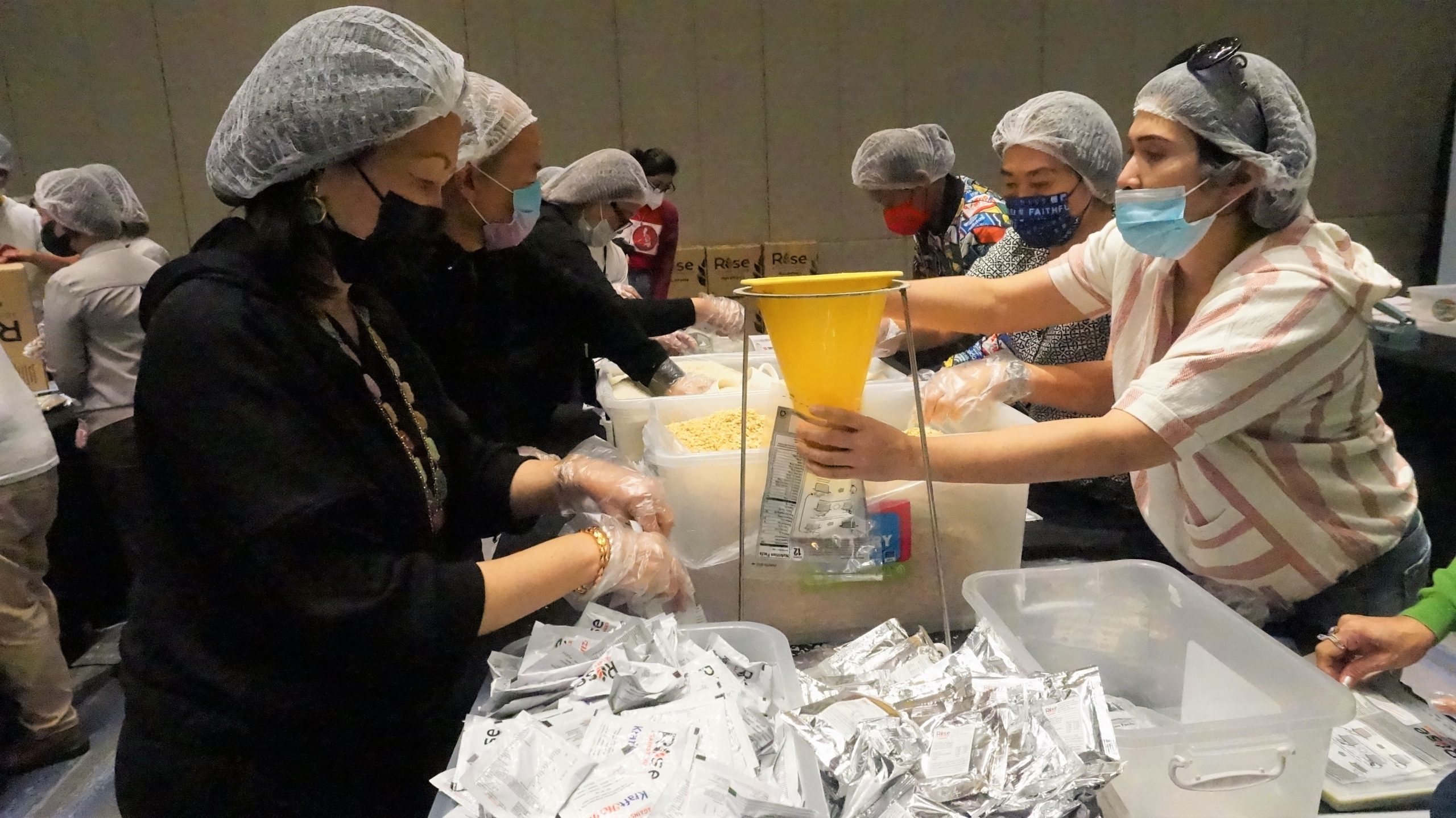 Meal packing volunteer event yielded 16,000 meal-packs in one day! - ICM